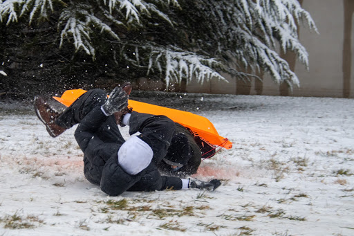 Photo essay: Students celebrate snow days with sledding, snowmen and ...